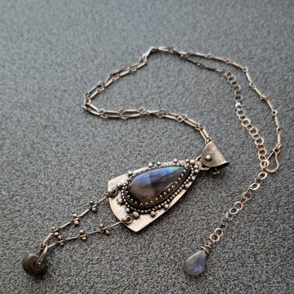 Amulet Necklace with Blue Labradorite and a Floral Embossed Backplate ...